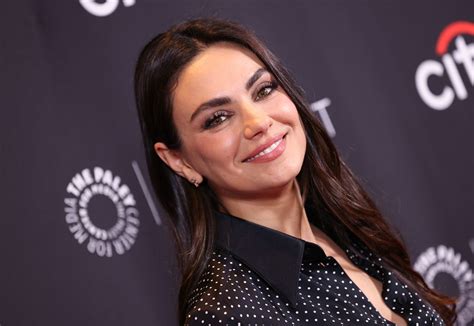 Mila Kunis Swapped Her Signature Dark Hair For Cherry Cola Red