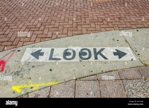 Sign Warning Pedestrians To Look Both Ways Before Crossing The Street