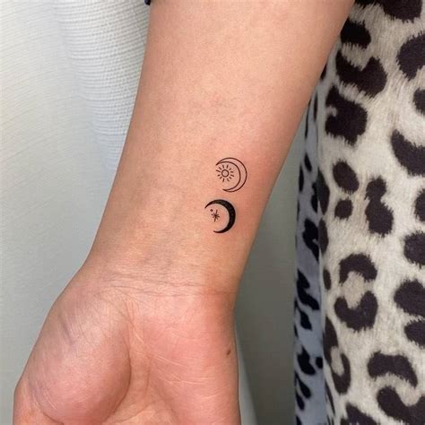 Minimalist Sun And Moon Tattoo On The Wrist