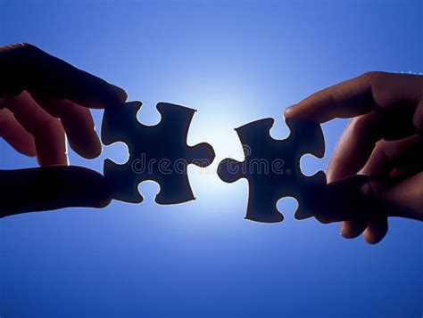 Hands Connecting Puzzle Pieces Against Blue Sky Stock Image Image Of Concept Solution 318834337