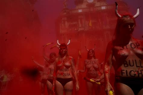 Watch Dozens Of Topless Activists Protest Bullfighting Before The
