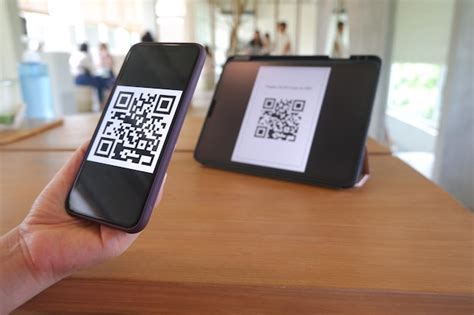 Premium Photo Using Technology Mobile Phone Scanning Qr Code For Payment