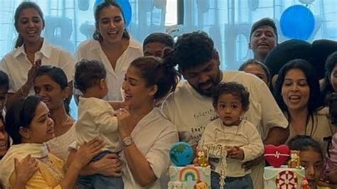 Vignesh Shivan Nayanthara Can T Stop Smiling As They Hold Twins Uyir Ulag Celebrate Birthday