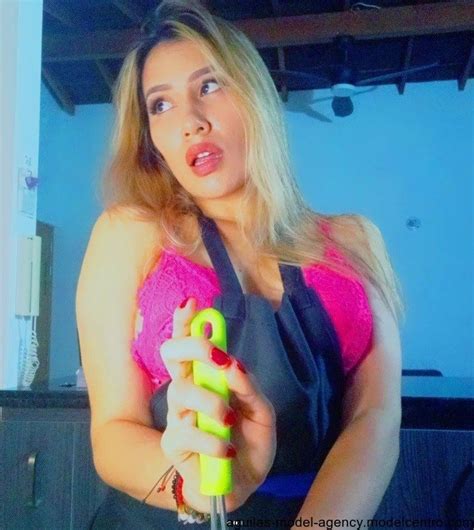 Lovely Blonde Babe Showing Her Nice Ass In Black Pants 15 Photos