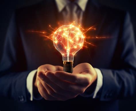Premium AI Image Businessman Hand Holding Lightbulb With Glowing