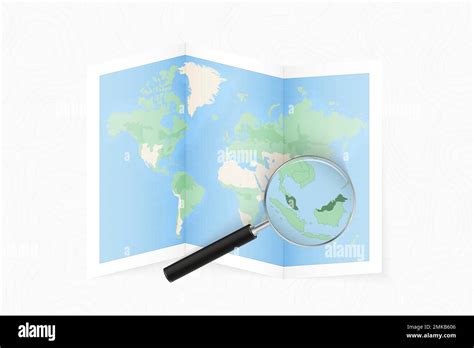 Enlarge Malaysia With A Magnifying Glass On A Folded Map Of The World Vector Paper Map Stock