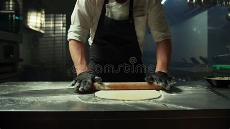 Chef Is Rolling Out The Sheet Of Pasta For Emilian Tortellini In The
