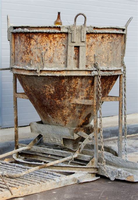 A Rusty Bucket With A Bottle On Top Of It Stock Photo Image Of Metal Machine 346494292
