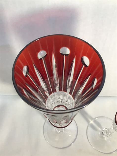 Pair Fabergé Xenia Cranberry Ruby Red Cut To Clear Crystal Champagne