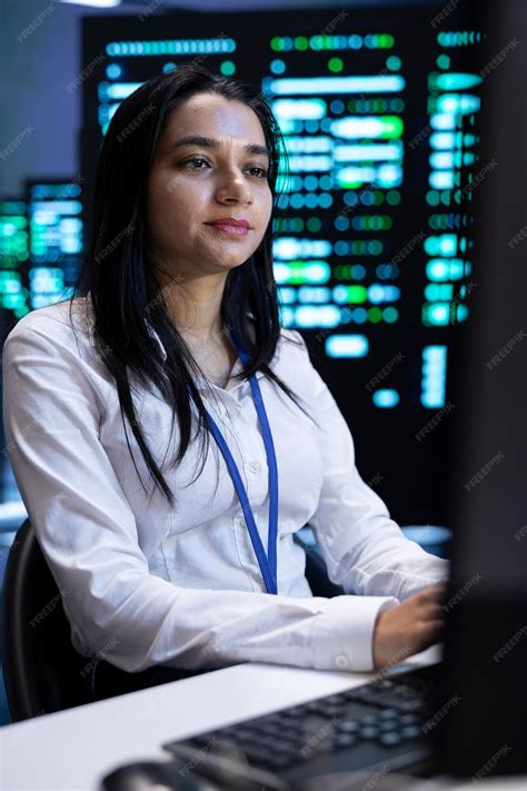 Free Photo Engineer Monitoring And Optimizing Data Center Performance