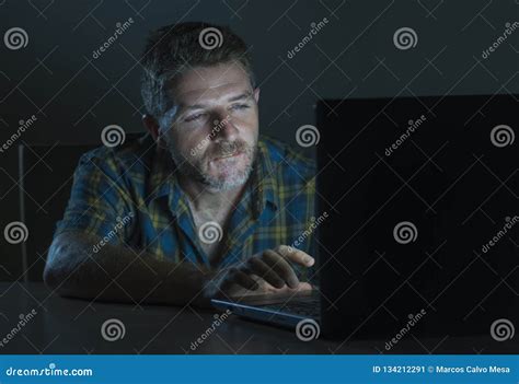 Young Aroused And Excited Sex Addict Man Watching Mobile Online In