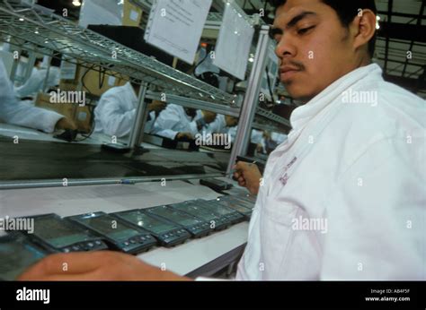 Quality Control Check On The Palm Pilot Assembly Line At The Flextronics Plant In Guadalajara