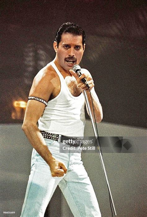 Freddie Mercury Of Queen Performs On Stage At Live Aid On July 13th