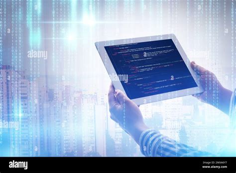Multiple Exposure Of Female Programmer With Tablet Digital Binary Code And Cityscape Closeup