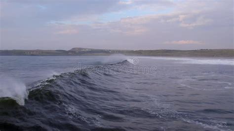 Ocean Waves Building Height Before Crashing In Shallow Water Stock