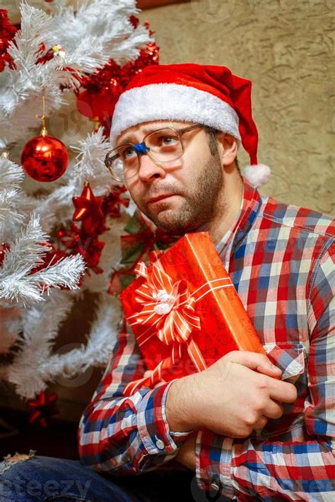 Vertical Photo Of Sed Lonely Nerd With Christmas T 16536809 Stock