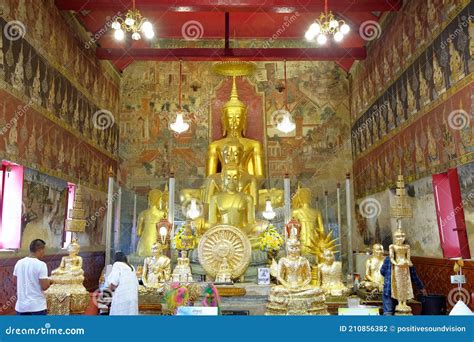 Devotees Making Merits At The Assembly Hall Viharn Of Wat Mahathat