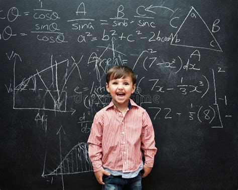 Yes More Math A Young Boy With A Blackboard Full Of Math Equations