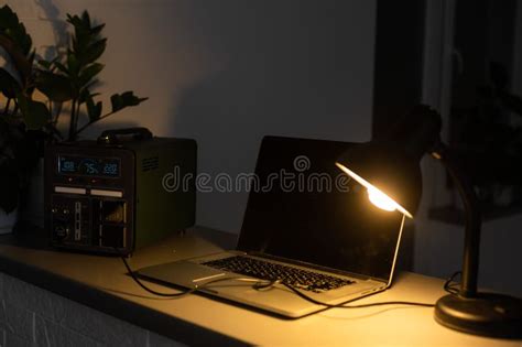 Portable Power Station Charging Gadgets On Table In Room Editorial