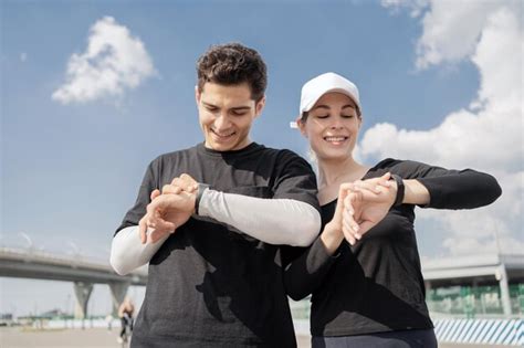 Premium Photo Using Smart Watch Fitness Apps Calorie Counter And Pulse A Sports Pair Of