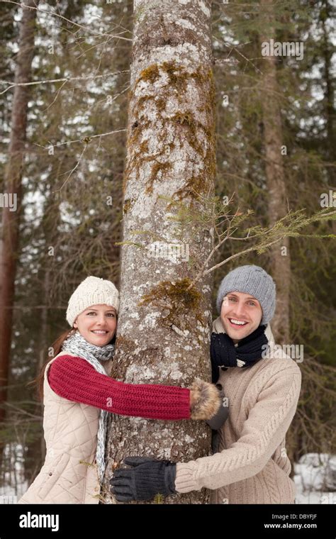 Couple Hugging Tree Hi Res Stock Photography And Images Alamy
