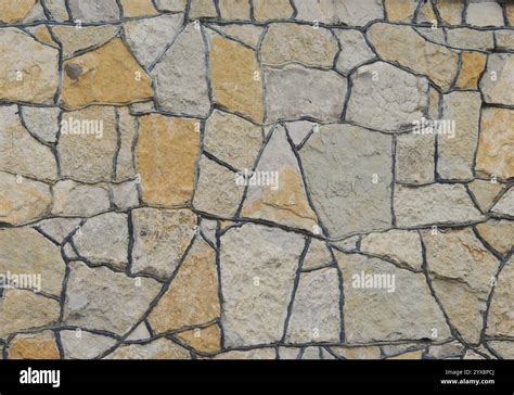 Cladding The Surface With Decorative Stone Of Abstract Shape Of Gray