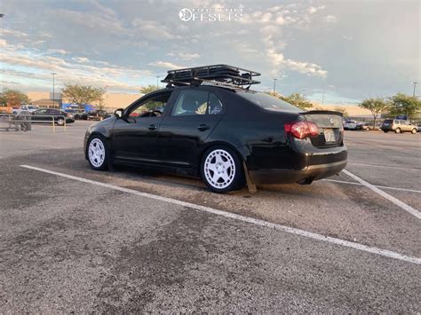 2009 Volkswagen Jetta With 17x75 35 Fifteen52 Turbomac And 22545r17