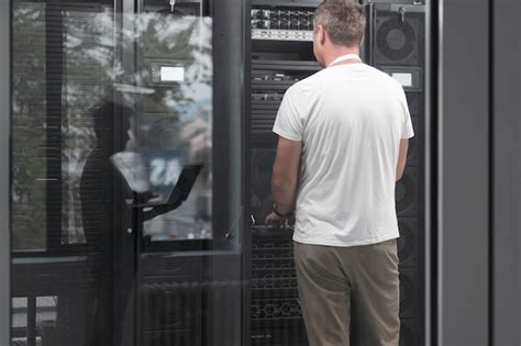 Premium Photo A Couple Of Server Engineers Cooperate In High Tech