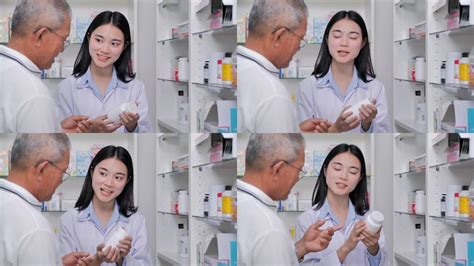 亚洲年轻女药剂师建议在药品商店的一名老人患者开药。专业，医学和保健，医学教育，制药部门，科学，咨询， 视频素材下载