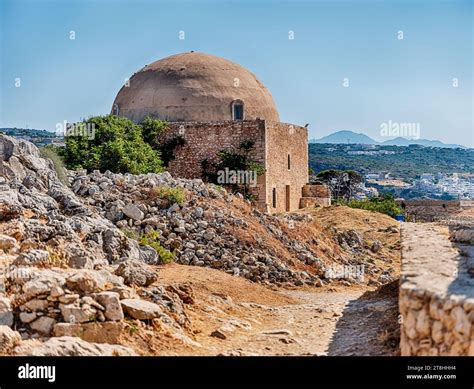 The Dome Of The Sultan Ibrahim Mosque In Rethymno Crete Stands Amid