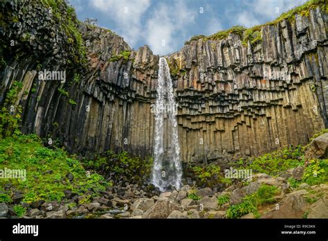 Svartifoss Waterfall Surrounded By Basalt Columns In The South Of