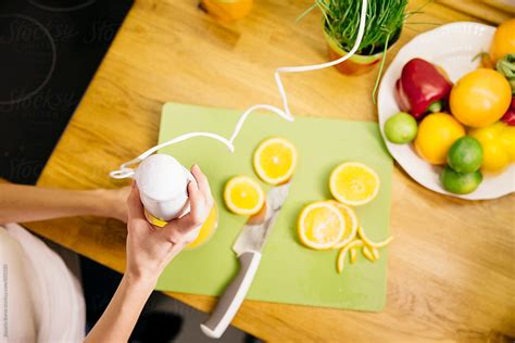 Overhead Photo Of A Woman With A Blender In Her Hand By Stocksy Contributor Beatrix Boros