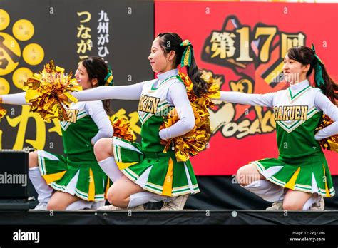 Japanese Teenage Women Cheerleader Yosakoi Dance Team In Green Costumes