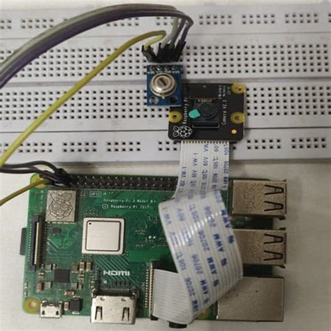 iot based contactless body temperature monitoring using mlx90614