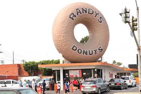 After 73 Years Las Iconic Randys Donuts Is Finally Touching Down In
