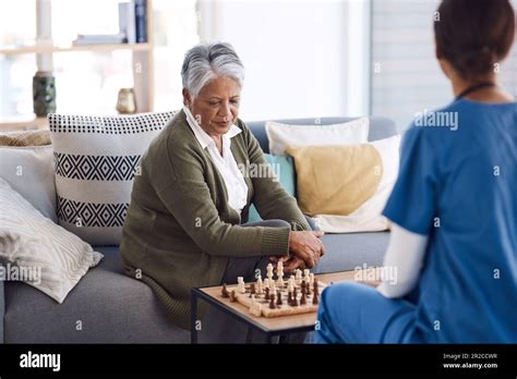Nurse Chess Or Old Woman In Nursing Home For Healthcare Problem Solving Skills Or Mental
