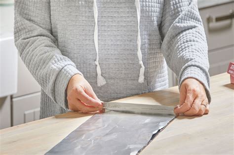 This Clever Hack Keeps A Hard To Reach Part Of The Kitchen Clean