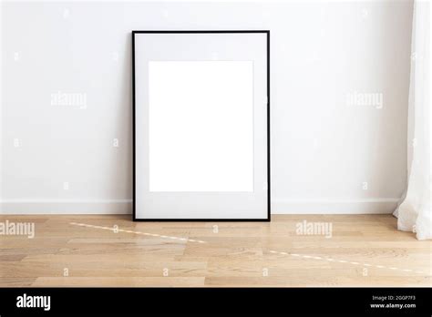 Rectangular Mock Up Frame With Passepartou Standing In A Room With