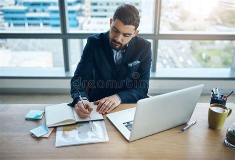 Computer Notebook And Business Man In Office For Financial Analysis Company Review And Data