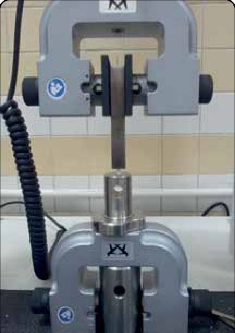 The Specimen In Position In The Instron Testing Machine For Compressive Download Scientific