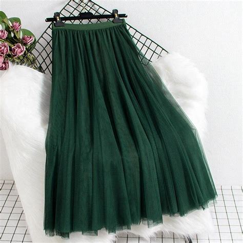 Купити Жіноча однотонна спідниця з високою талією Qooth Багато кольорів