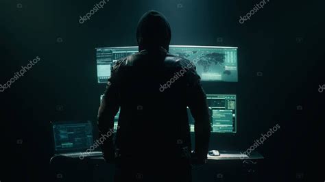 Hacker Anónimo Viendo Datos En Monitores De Computadora 2023