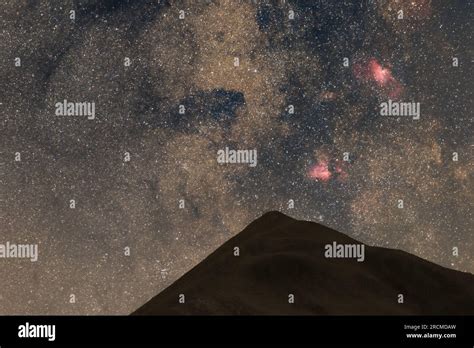 Stars At The Night Sky With M16 And M17 Nebulae In The Constellation Of