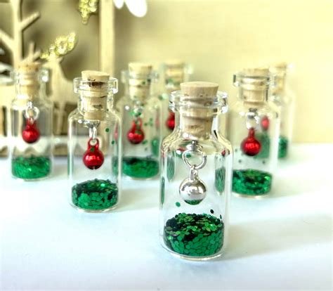 Tiny Bottle With Hanging Bell And Glitter Holiday T Or Keepsake Collectible Stocking