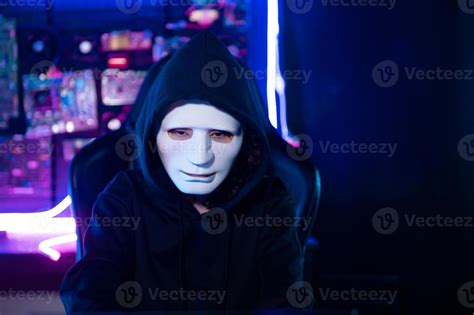 a hacker is using laptop computer to steal data in the night 20463068