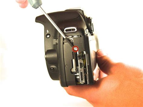 Canon EOS Rebel T1i Camera Battery Notch Replacement IFixit Repair Guide