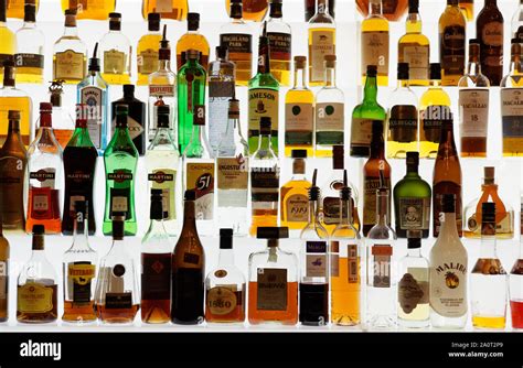 MOSCOW, RUSSIA - November 26, 2015: Various bottles of alcohol sitting ...