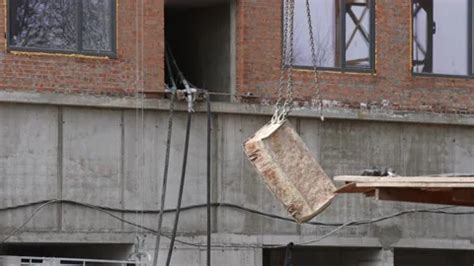 An Empty Container Is Lifted By A Crane Stock Video Pond