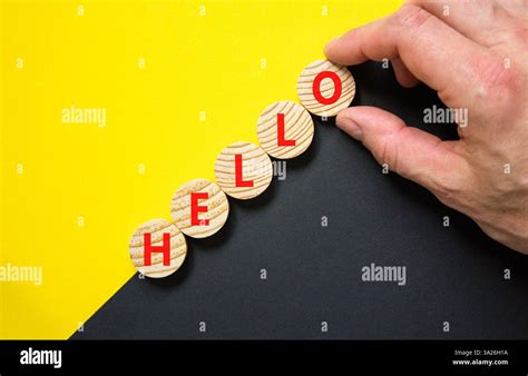 Hello Symbol Concept Word Hello On Beautiful Wooden Circles Beautiful Yellow And Black