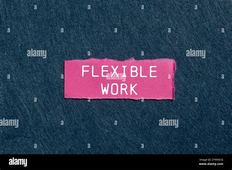 Flexible Work Message Written On Ripped Pink Torn Paper Piece On Gray Background Conceptual